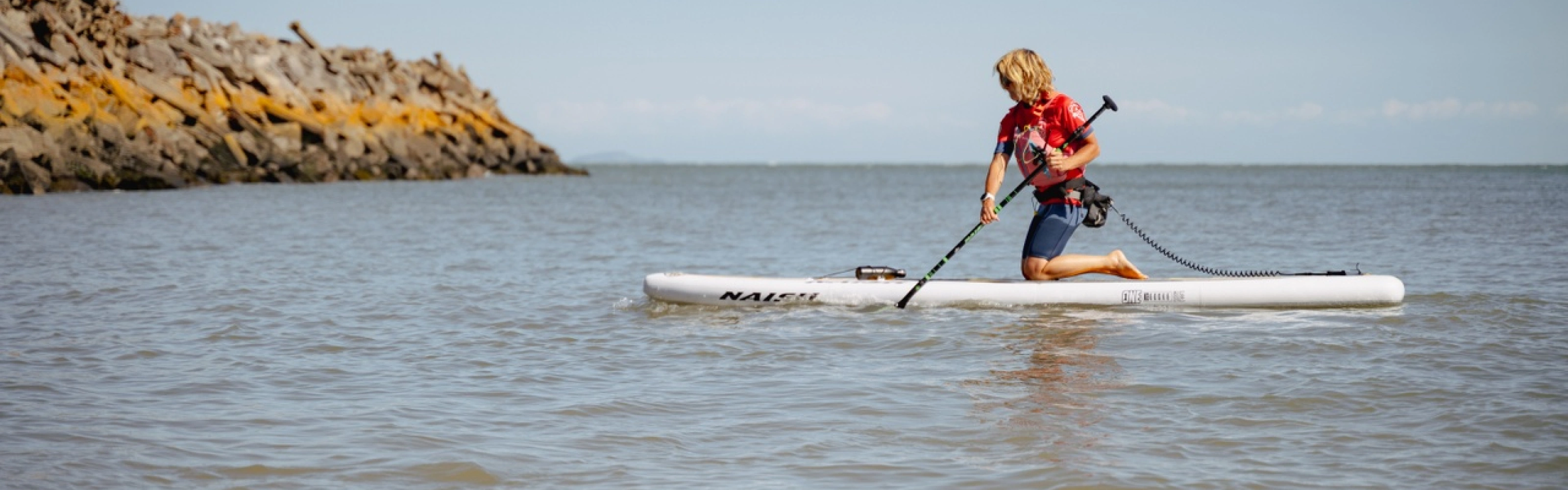 Stand-up paddleboard lessons in Wales | Watersports | Visit Wales